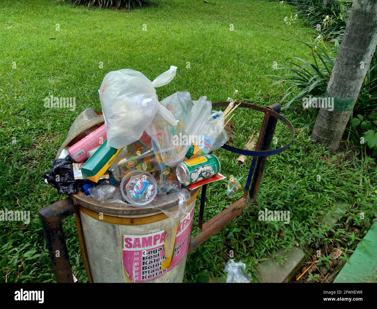 The dustbin with natural background Stock Photo - Alamy