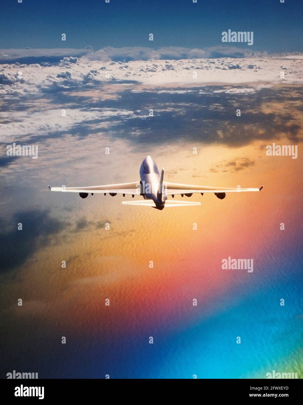 An image of a Boeing 747 Airplane over the clouds Stock Photo - Alamy