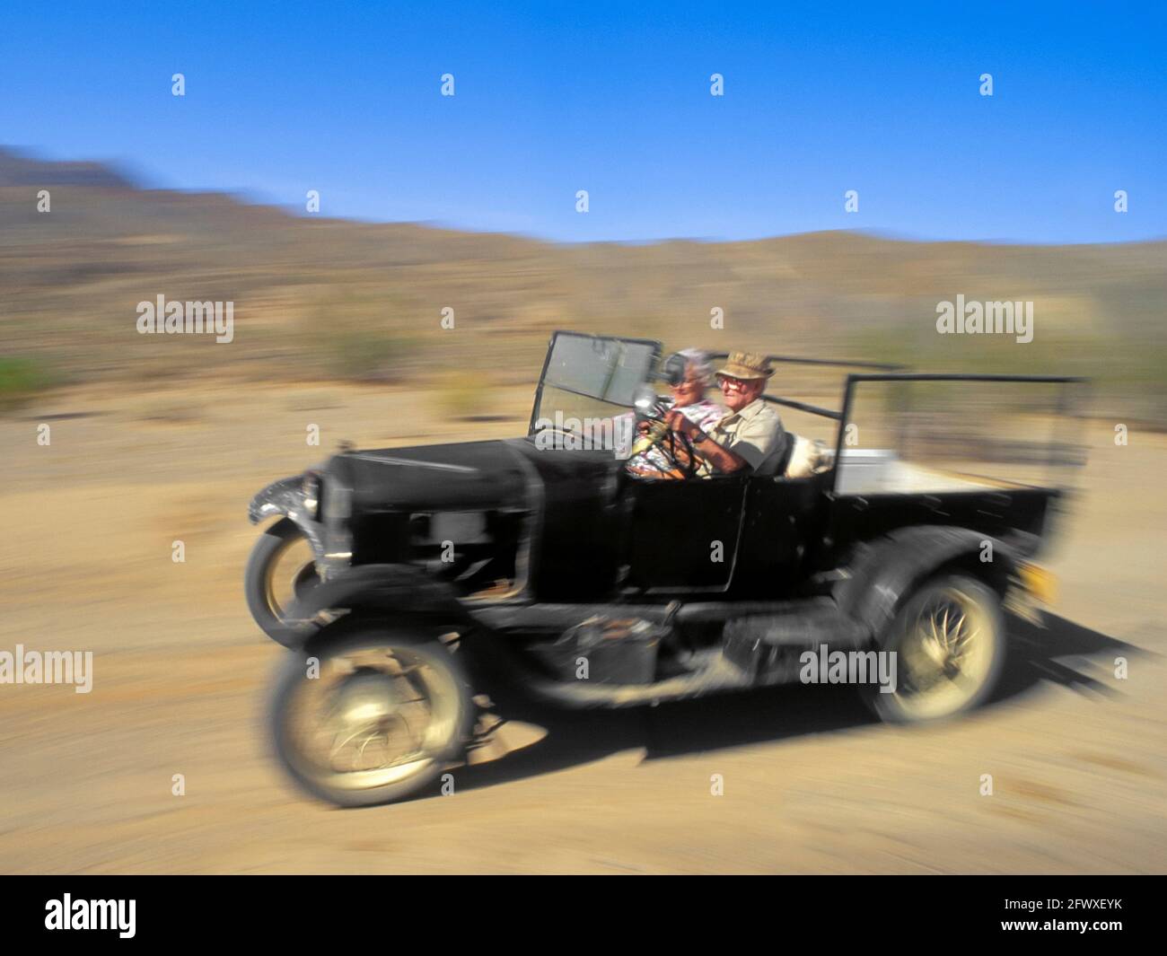 Elderly Couple Out for Drive in a Model T Ford Stock Photo - Alamy