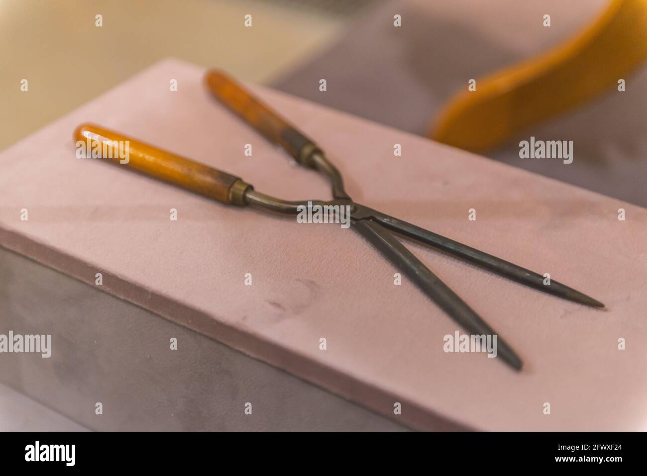 Curling irons of the early XX century. Made of steel and wood curling ...