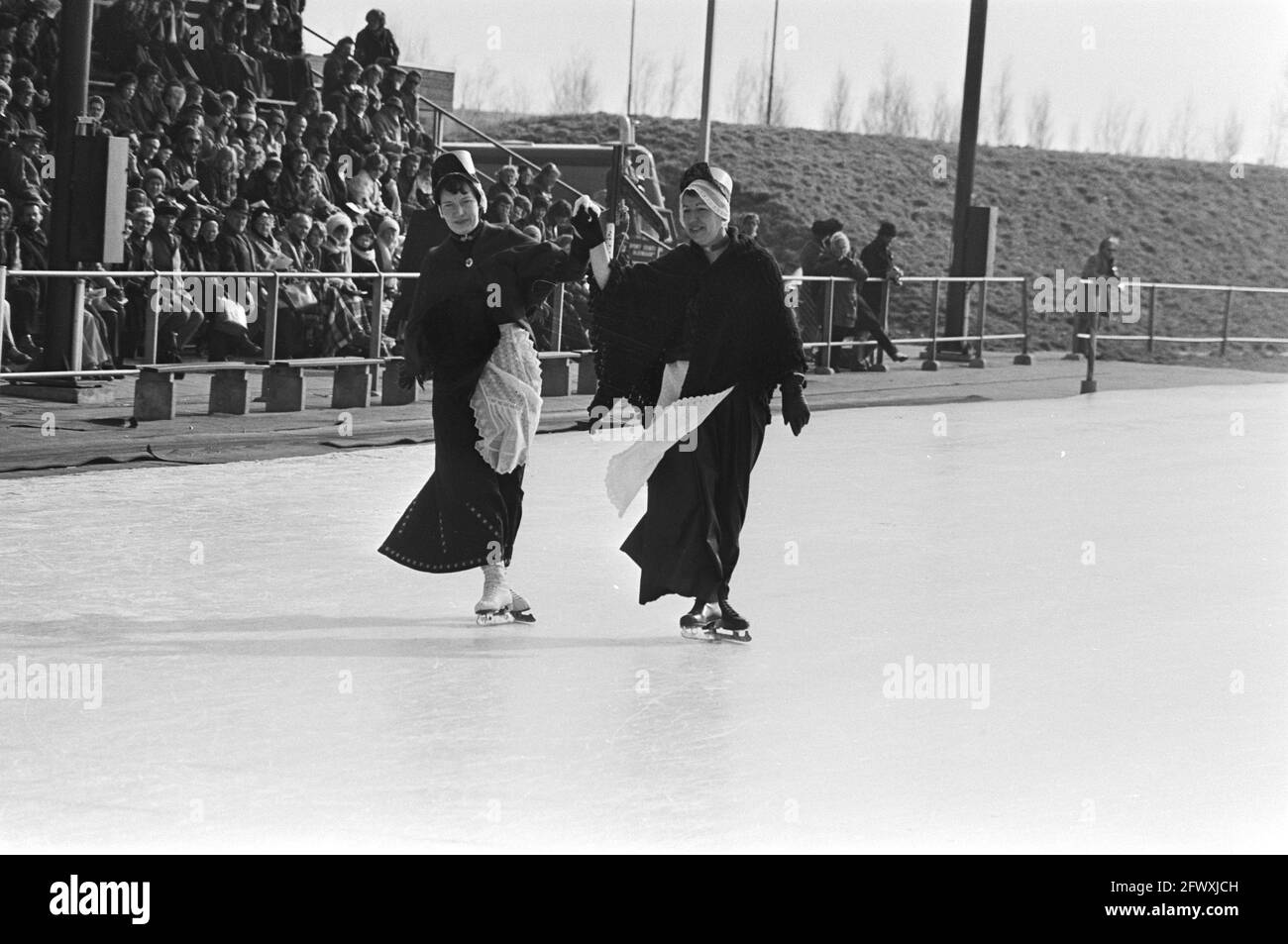 Old-Dutch ice folklore on Alkmaar ice-skating rink; schooner riding in ...