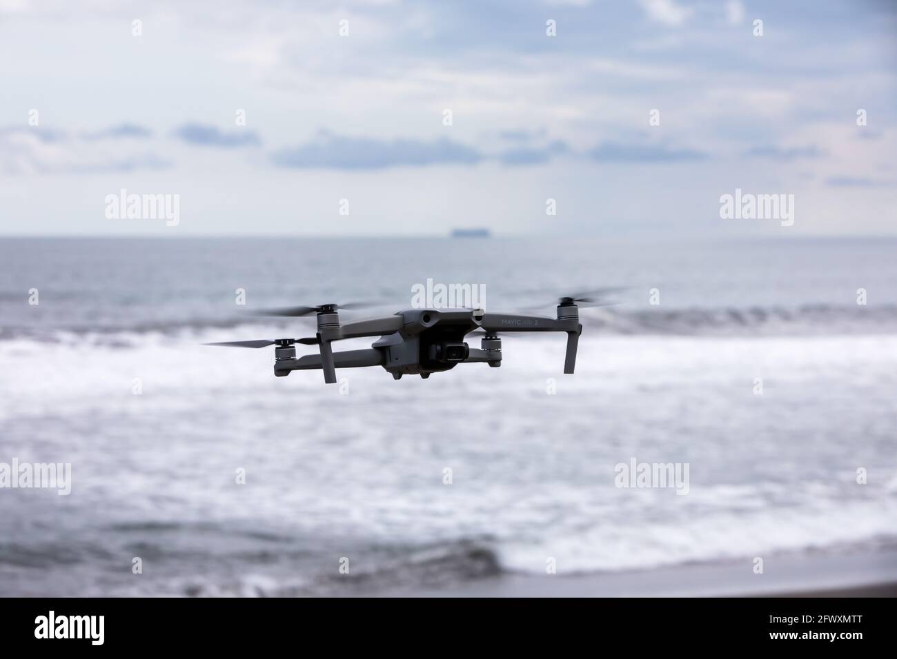 Puntarenas, Costa Rica - April 20: Drone over the black, volcanic beach ...