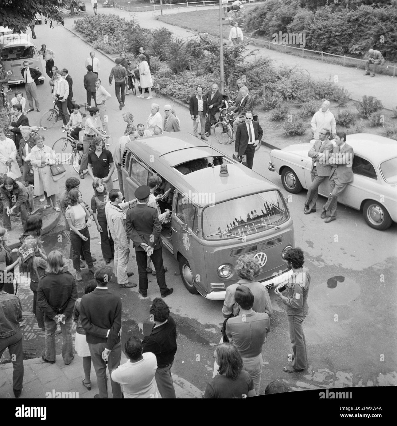 Police detectives (in white spiked suits) make arrests in Studio 7 in ...
