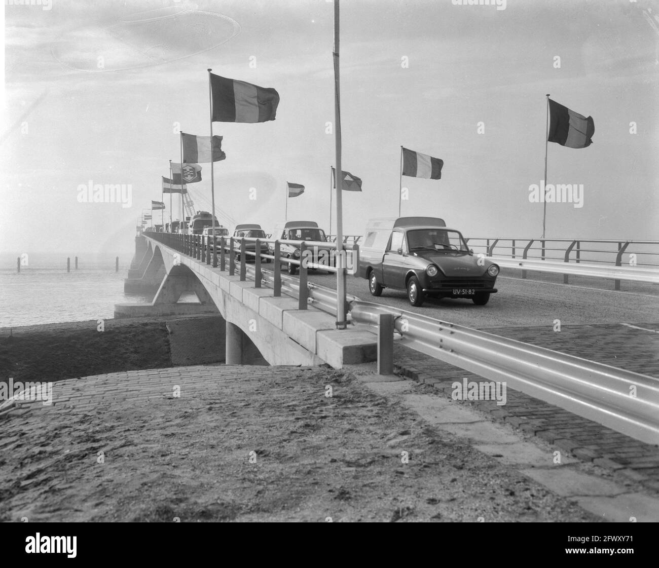 Opening of the Oosterschelde Bridge; the first traffic passes the new ...