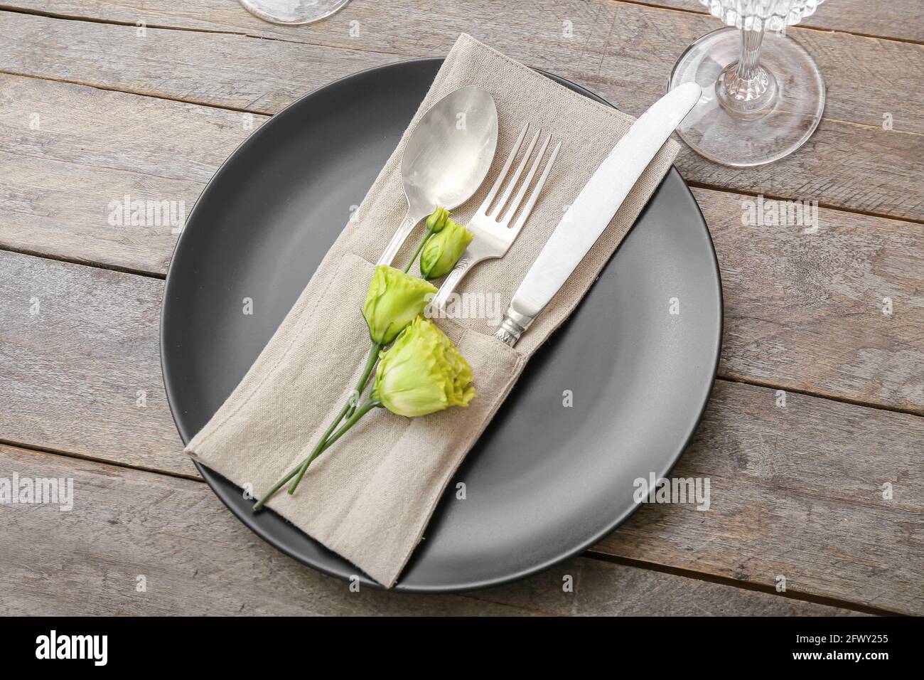 Beautiful table setting on wooden background Stock Photo - Alamy