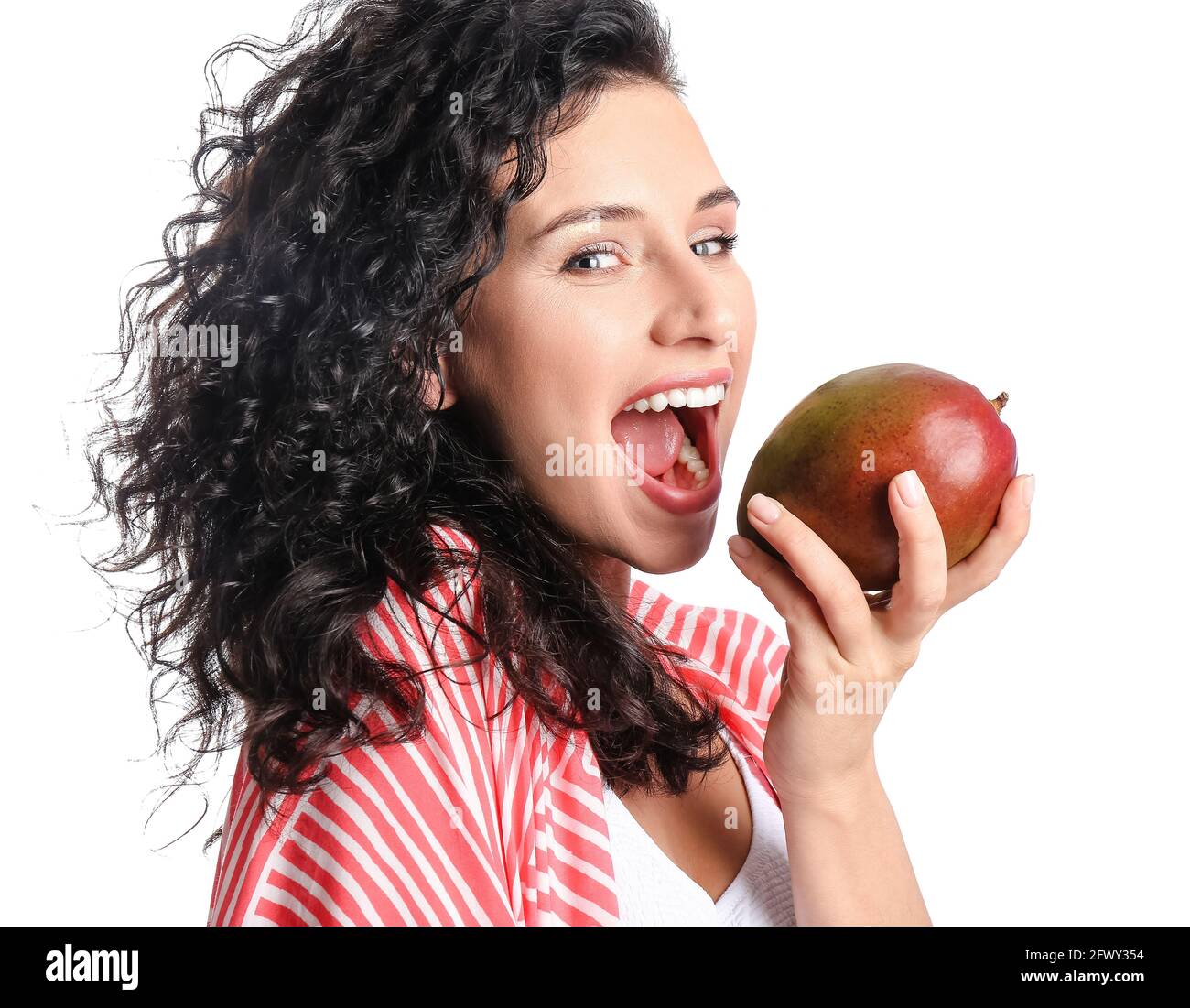 Beautiful woman with fresh mango on white background Stock Photo - Alamy
