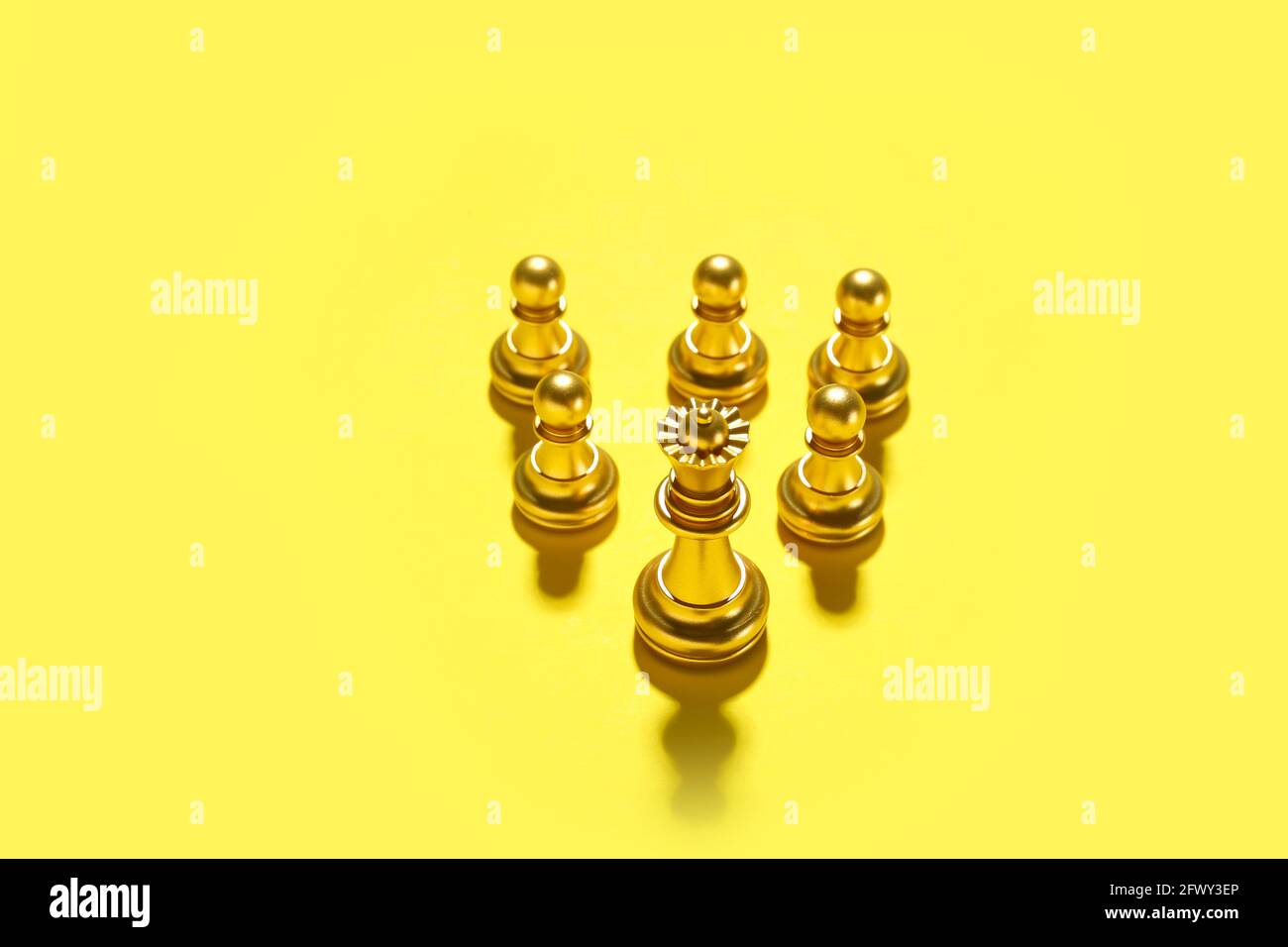 Chess pieces on color background. Hierarchy concept Stock Photo - Alamy