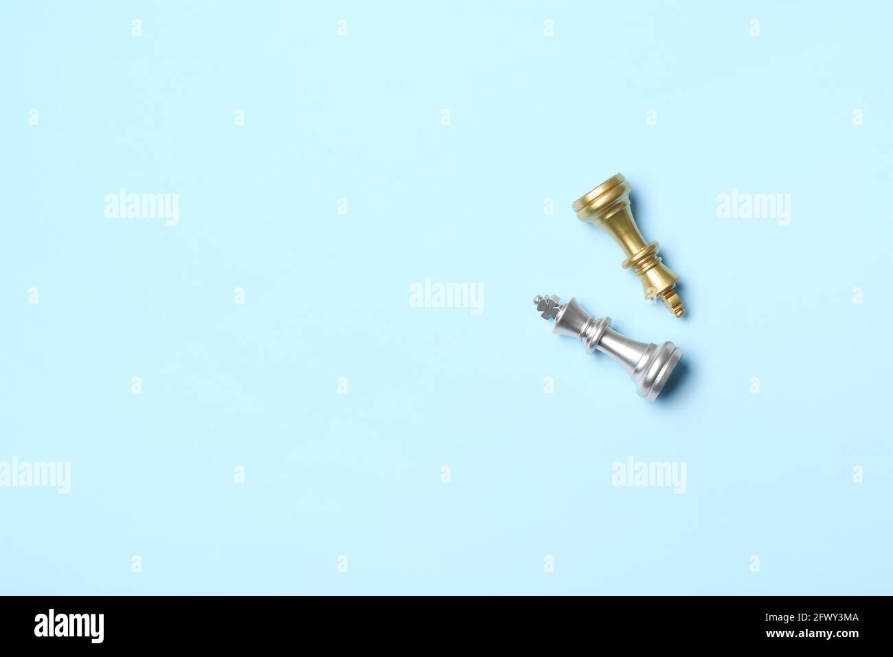 Chess pieces on color background Stock Photo - Alamy