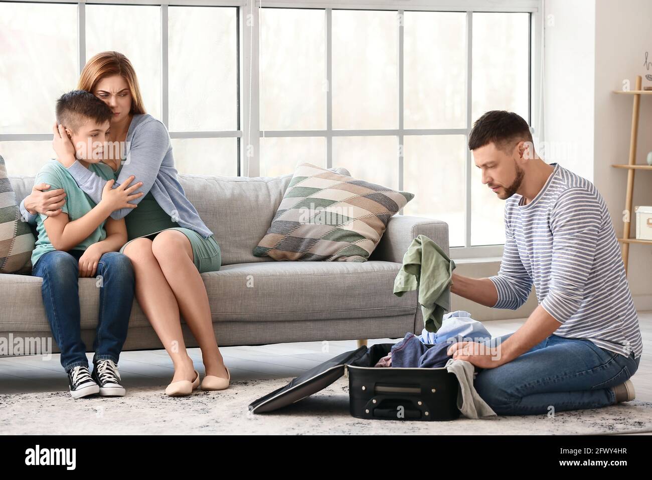 Sad boy suitcase hi-res stock photography and images - Alamy