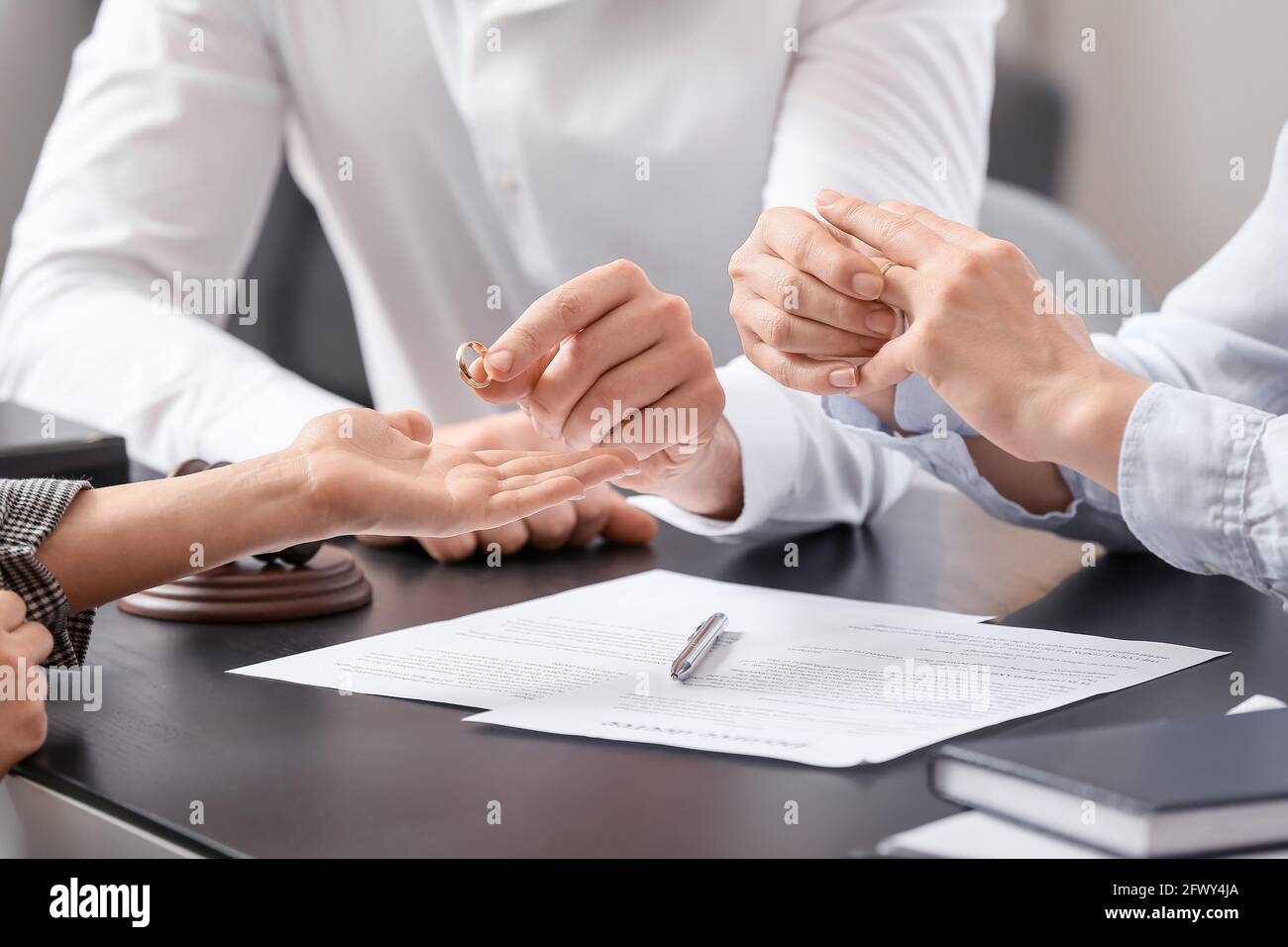 Couple taking off rings hi-res stock photography and images - Alamy
