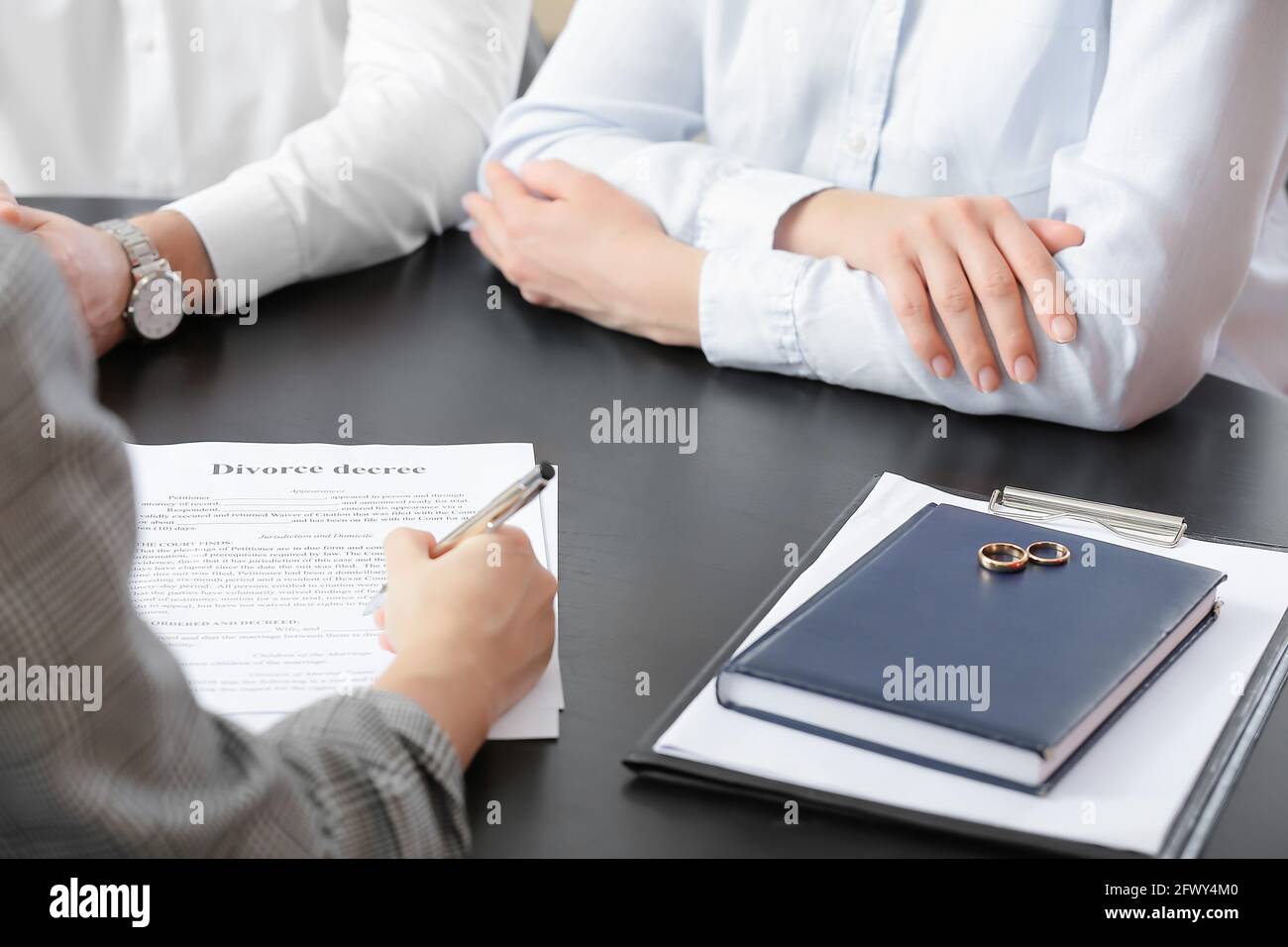Husband signing decree divorce agreement hi-res stock photography and ...