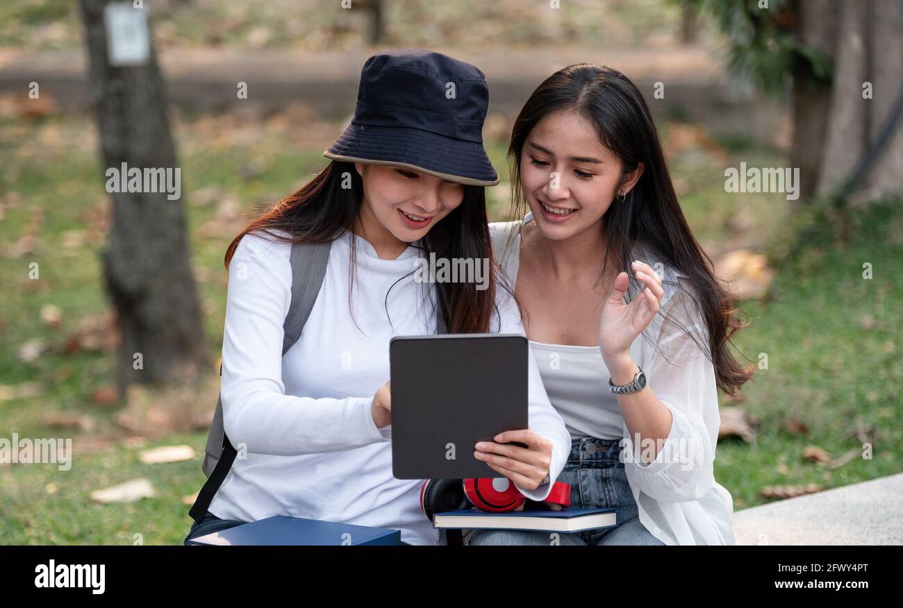 Group Of Asian Students Or Preparing For Lectures Outdoor, Studying ...