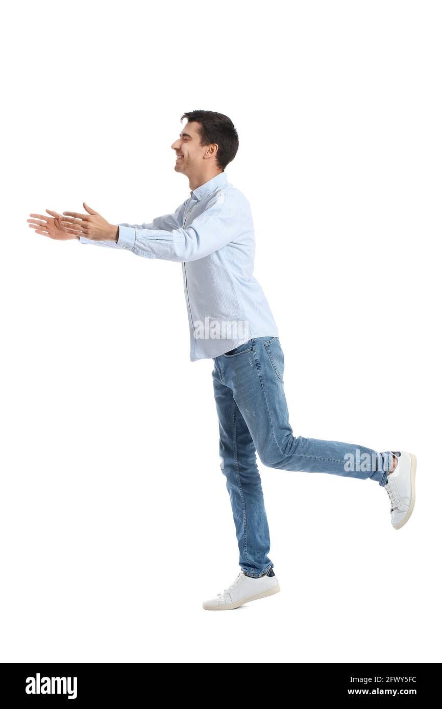 Young man opening arms for hug on white background Stock Photo - Alamy