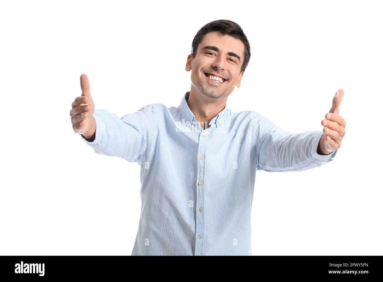 Young man opening arms for hug on white background Stock Photo - Alamy