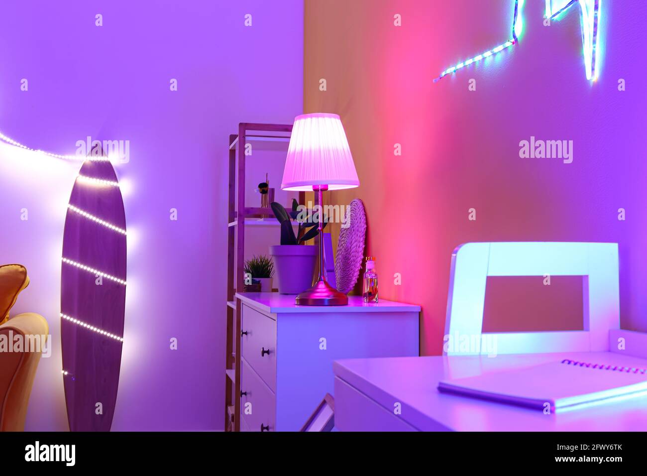 Interior of modern room with neon lighting Stock Photo - Alamy
