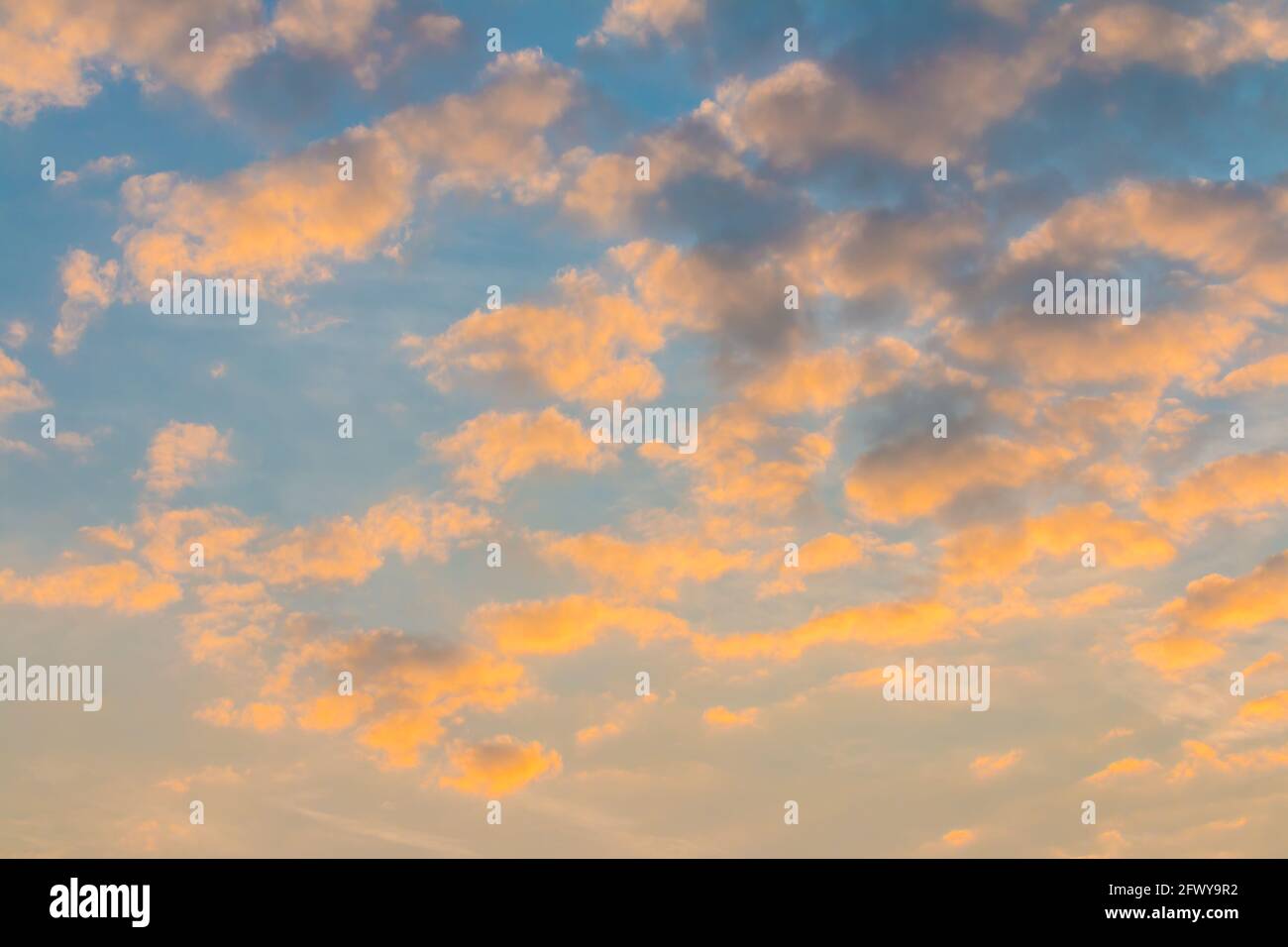 Sunset. blue sky and clouds background Stock Photo - Alamy