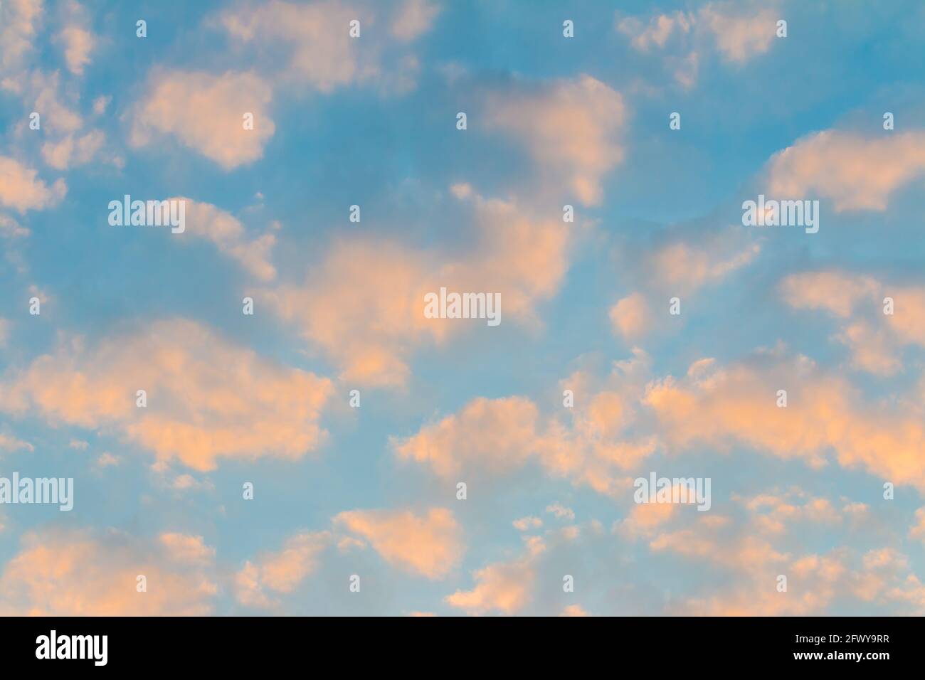 Sunset. blue sky and clouds background Stock Photo - Alamy
