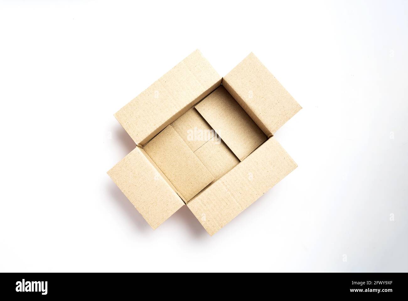 Top view of a brown cardboard box on white background Stock Photo - Alamy