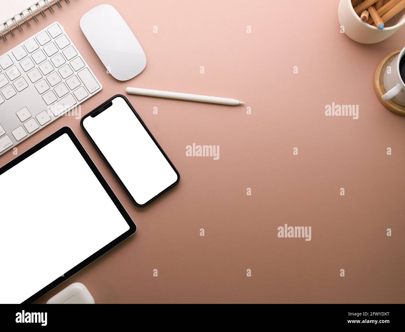 Creative flat lay workspace with tablet, smartphone, accessories and ...