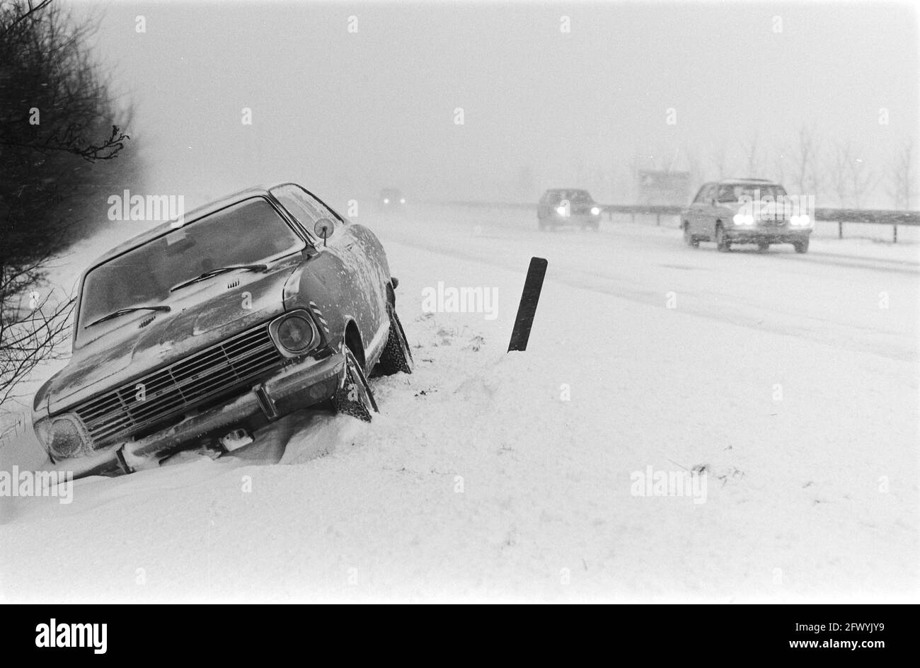 Car stranded on highway in snow, December 31, 1978, Autos, SNOW ...