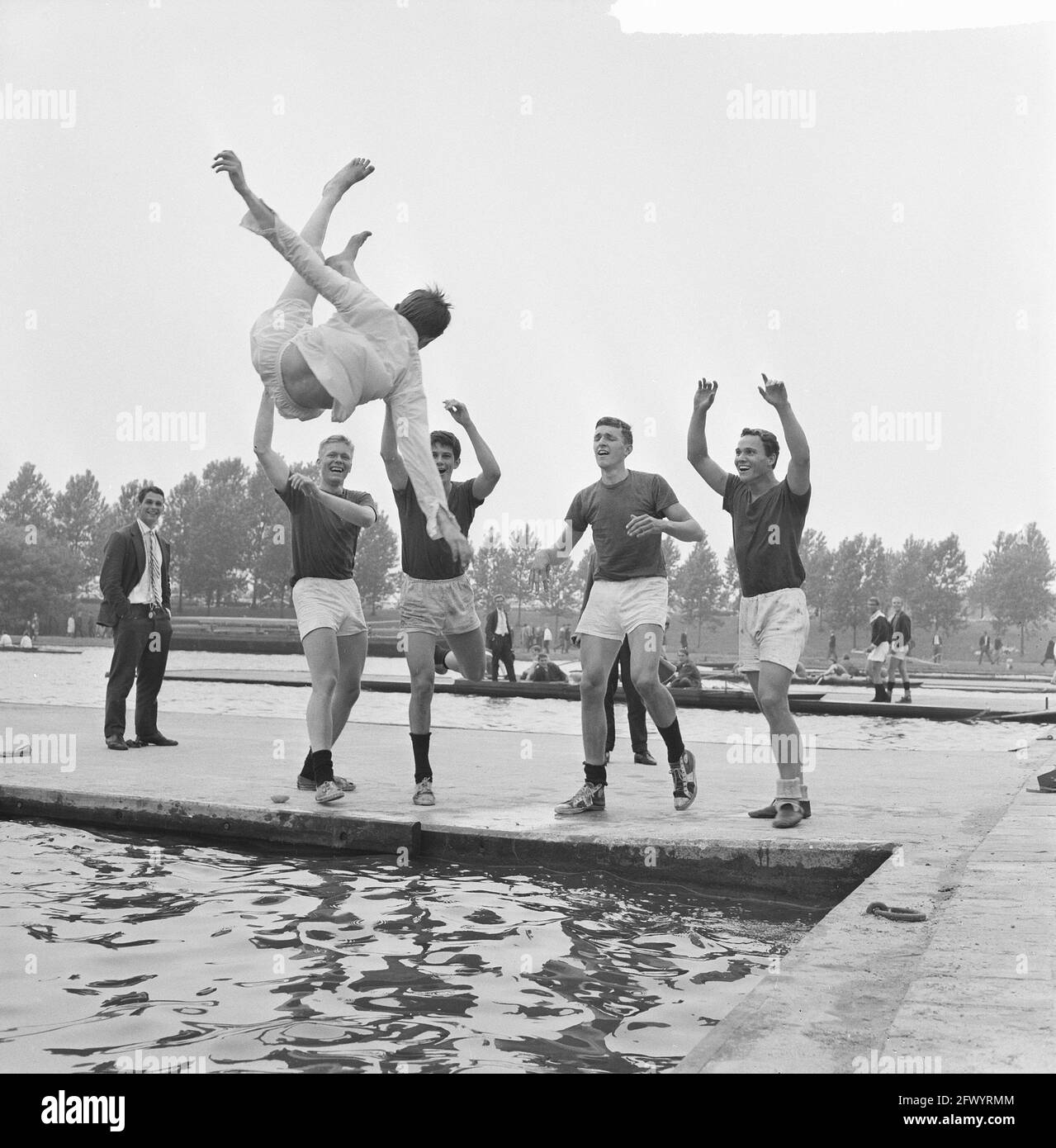 Rowing race on the Bosbaan, Laga's four throw their coxswain Hallie ...