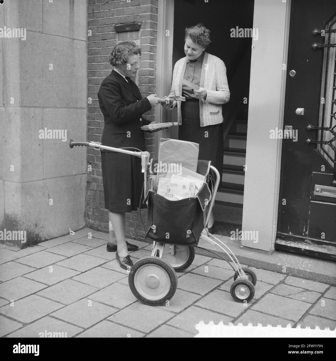 Female letter carriers hi-res stock photography and images - Alamy