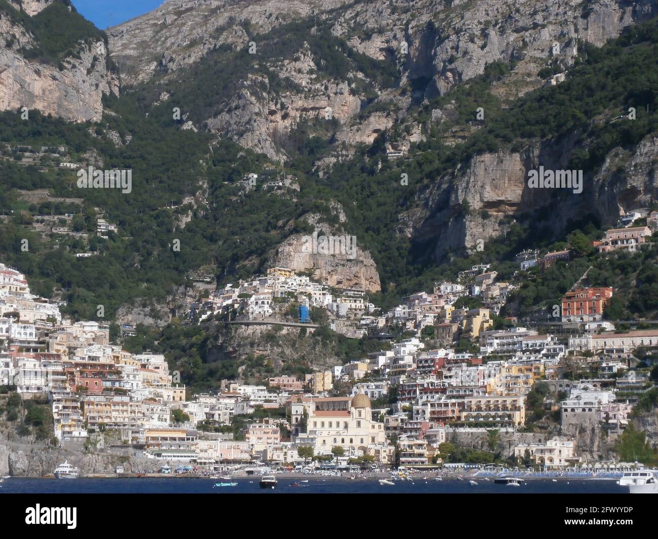 Beautiful buildings below the rocky mountain in Positano, Italy Stock ...
