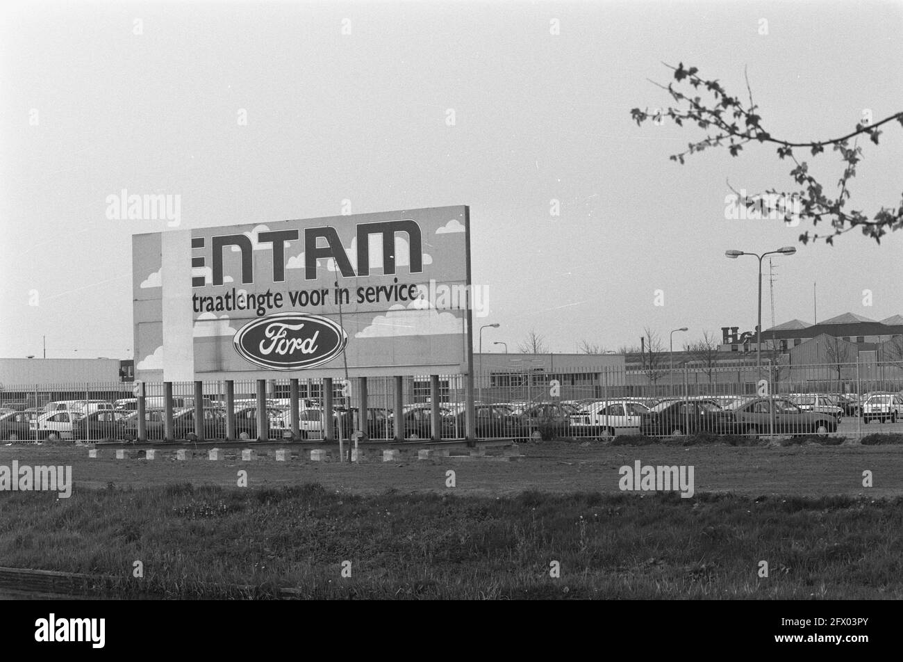 Cars on parking lot with billboard of ford, April 26, 1988, cars ...