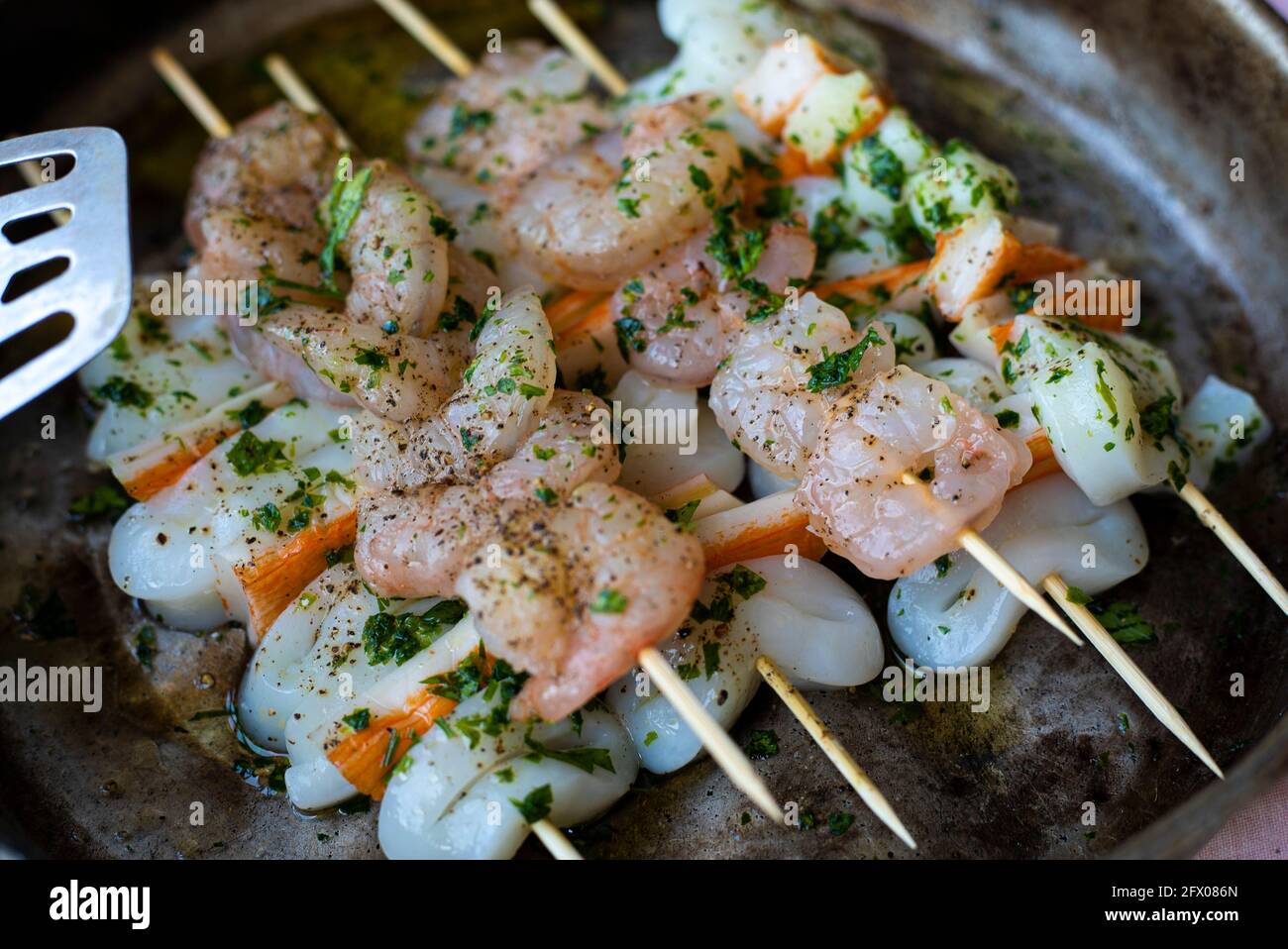 Fish skewers detail 2 Stock Photo - Alamy