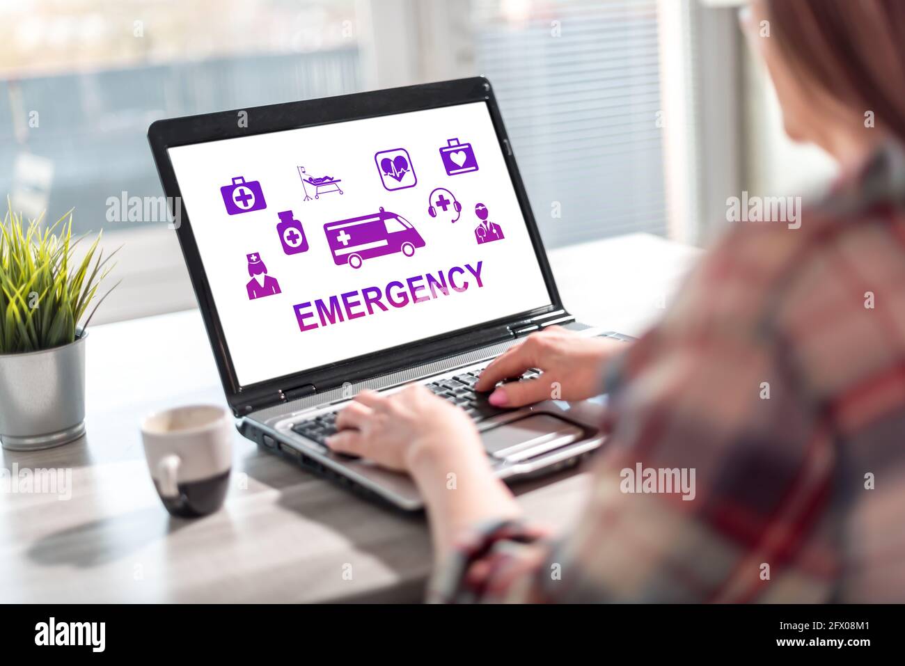 Laptop screen displaying an emergency concept Stock Photo - Alamy