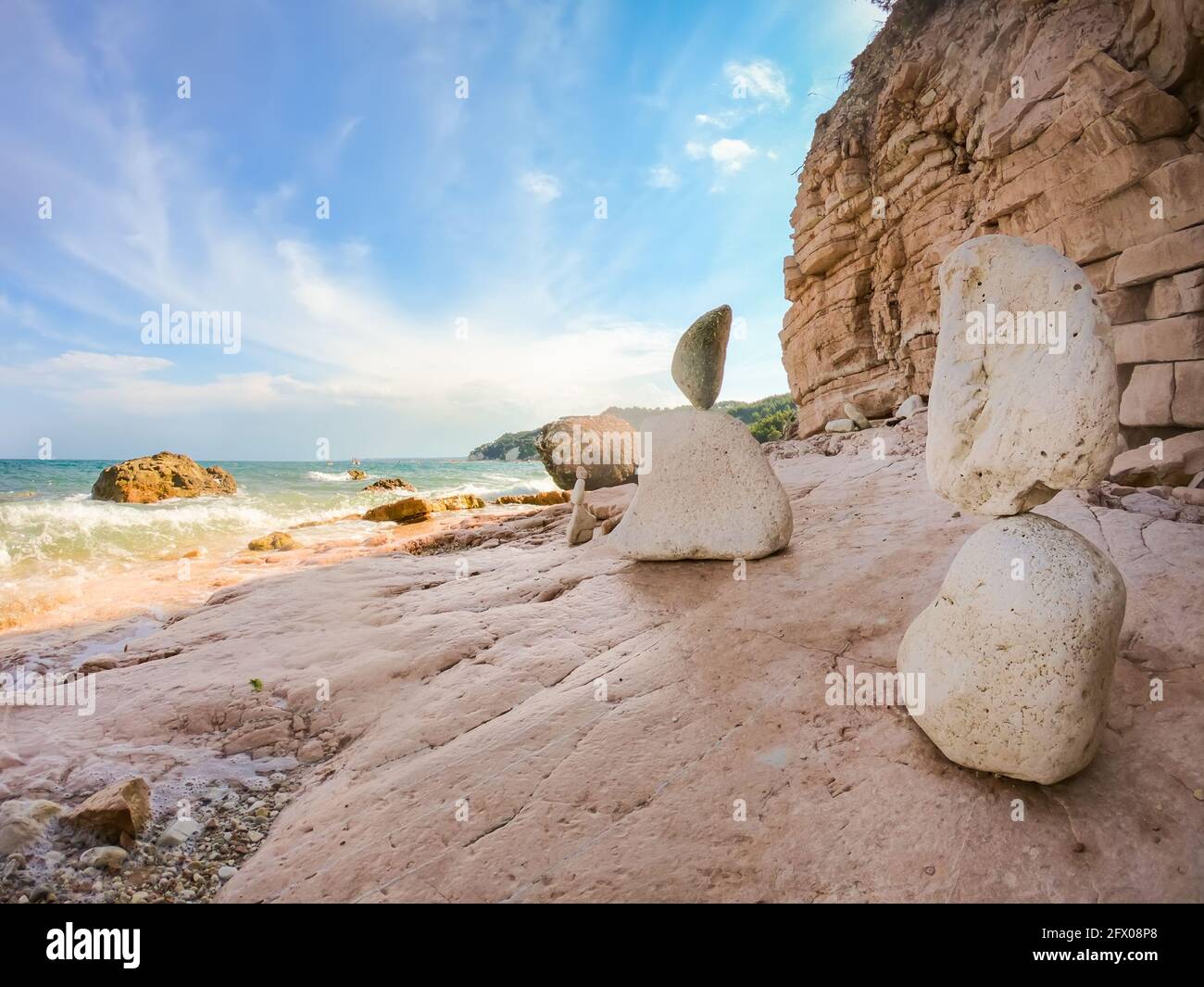Stone sculptures on the Sassi Neri beach- Black stone beach, Conero ...