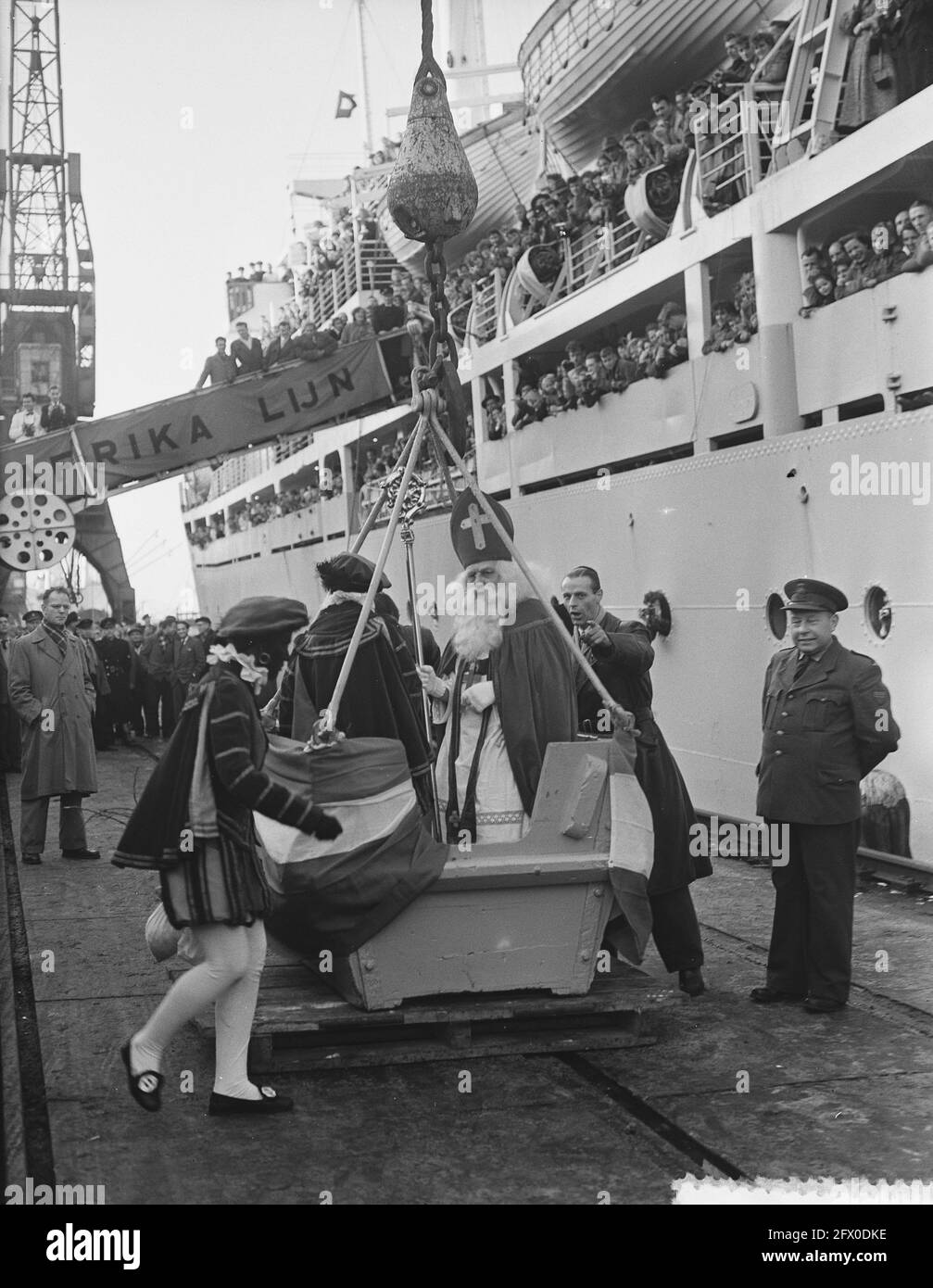 Saint Nicholas and Black Pete visit the emigrant ship Groote Beer ...