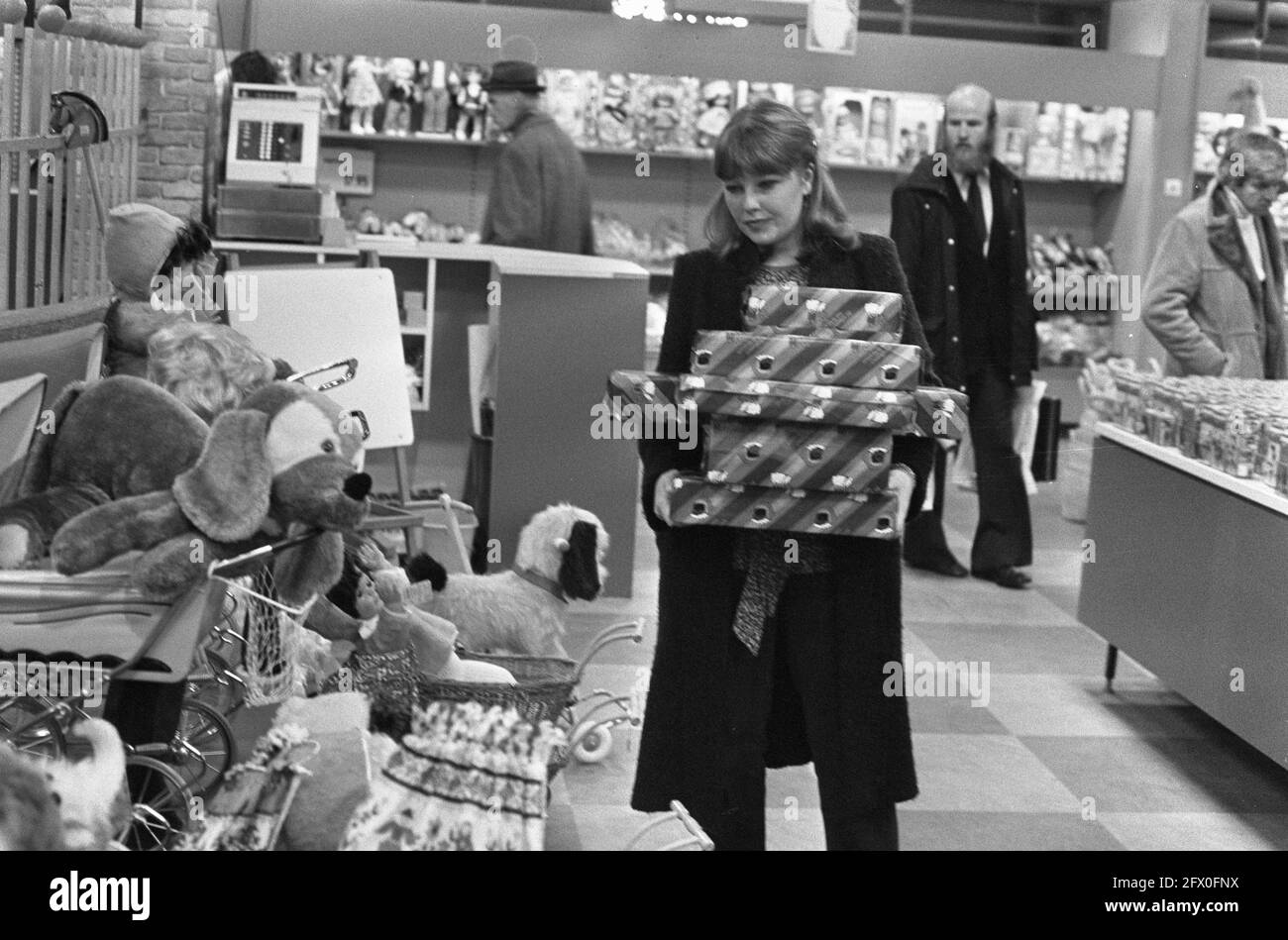 Lady lugging packages hi-res stock photography and images - Alamy