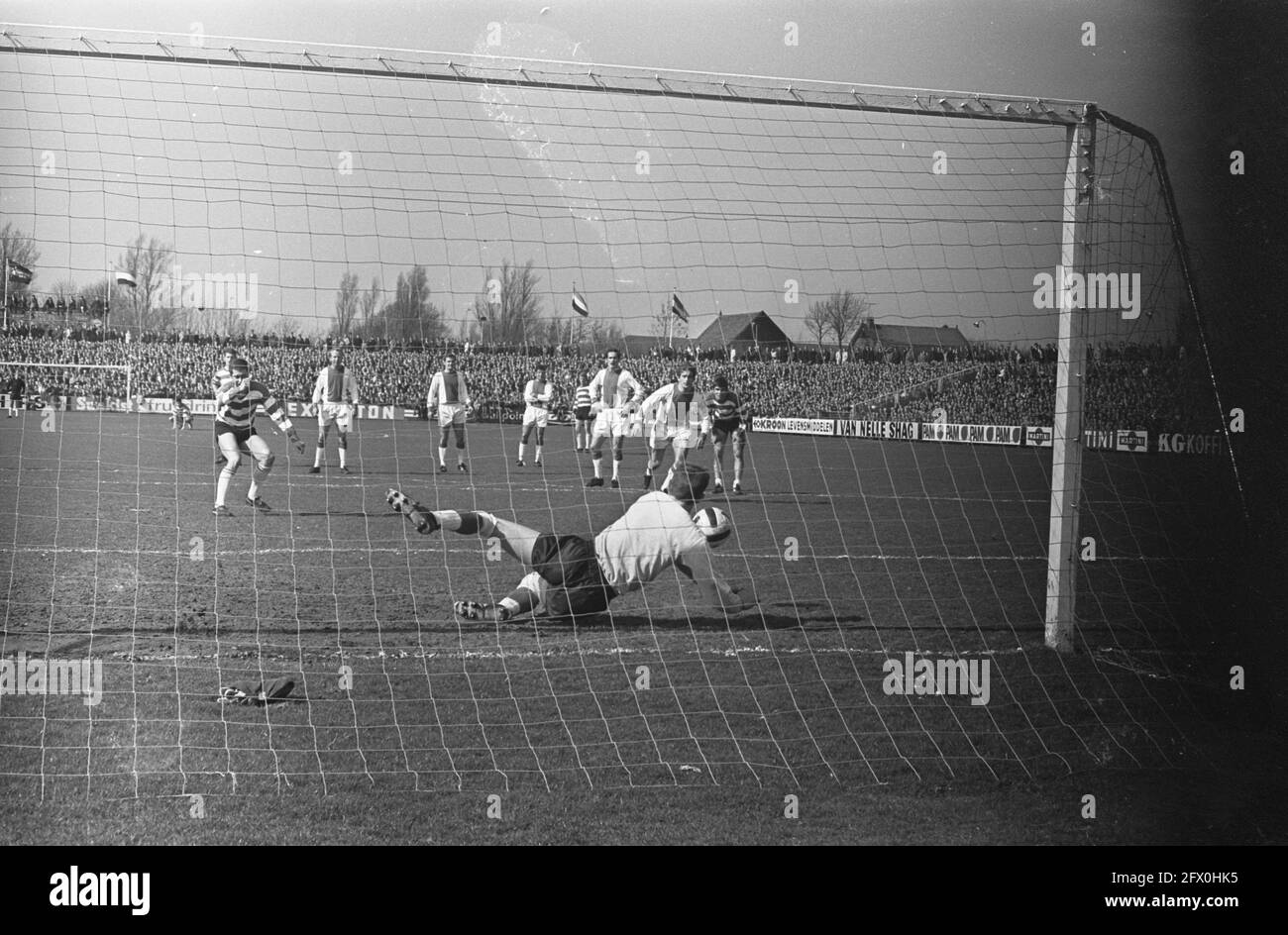 Goalkeeper gert bals stops penalty kick Black and White Stock Photos ...