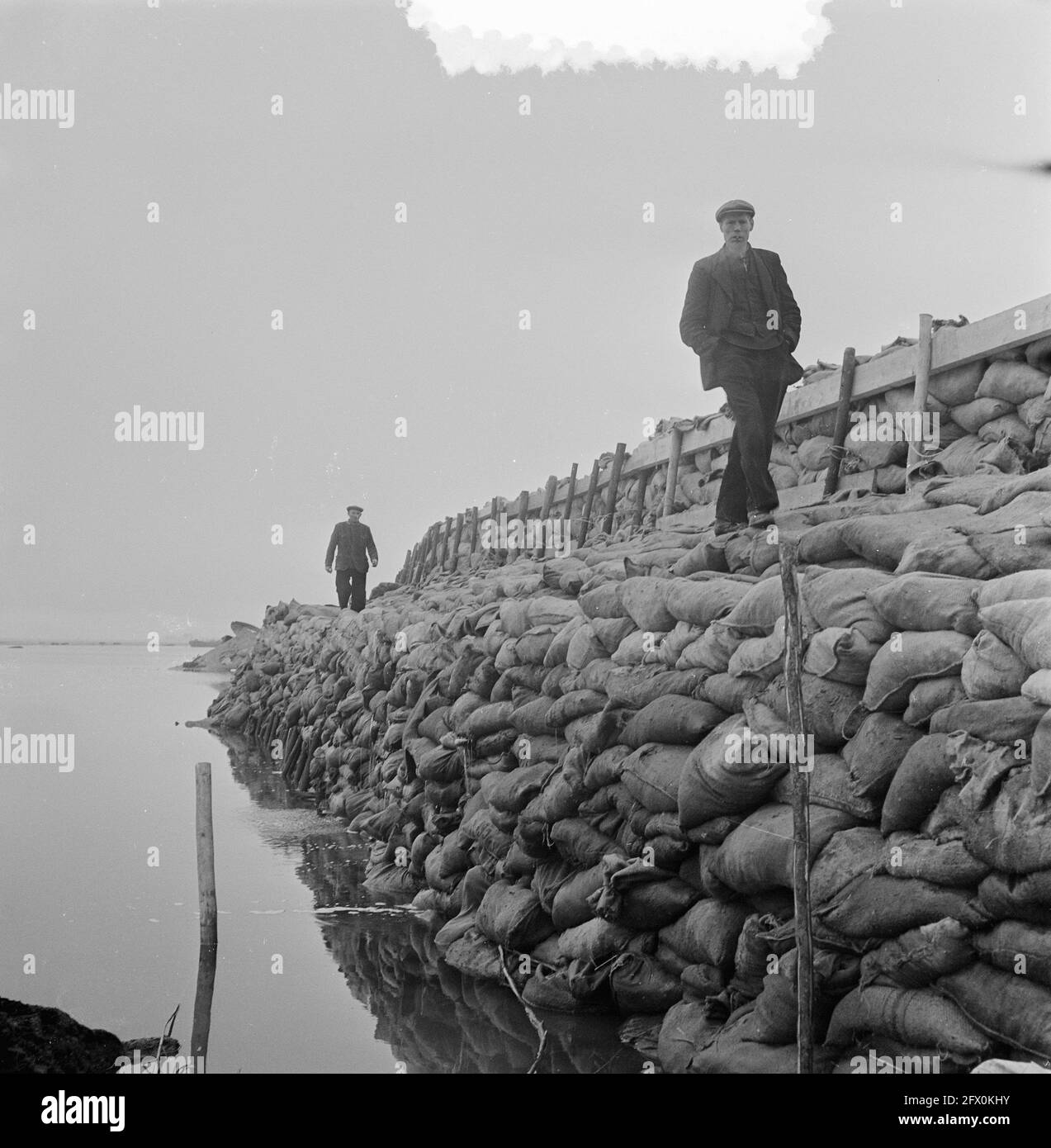 Sandbags form temporary sea dike tholen hi-res stock photography and ...