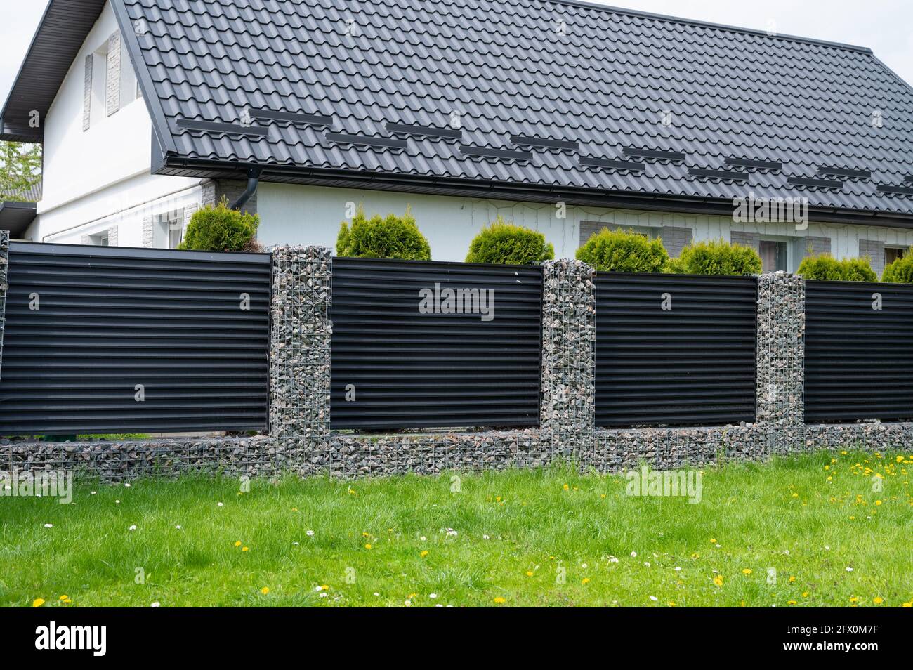 New build gabions fence. Gabion fence Stock Photo - Alamy