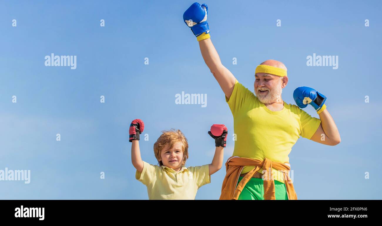 Little boy sportsman at boxing training with coach. Sports man coaching ...
