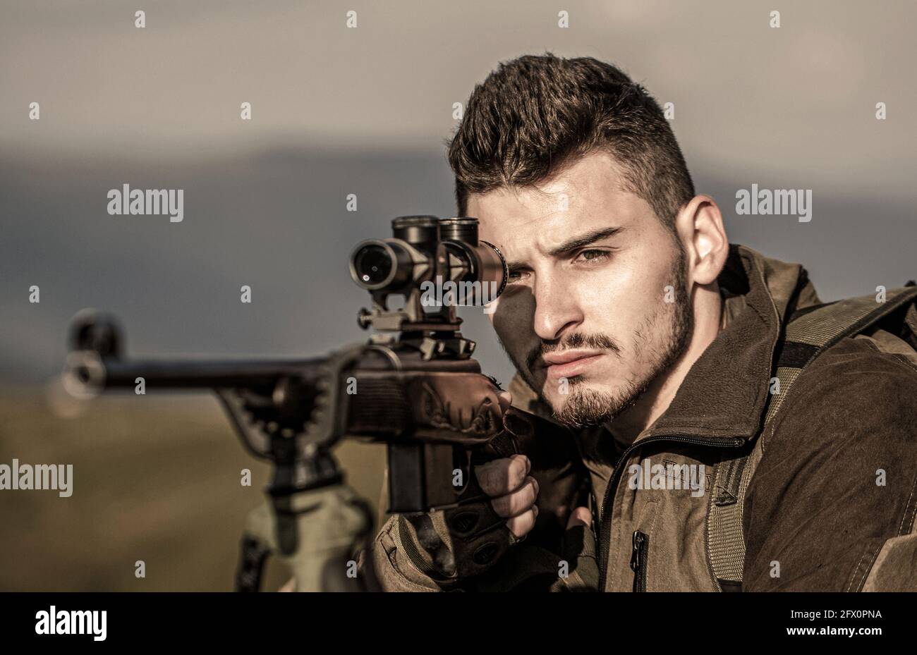 Process of hunting during hunting season. Male hunter in ready to hunt ...