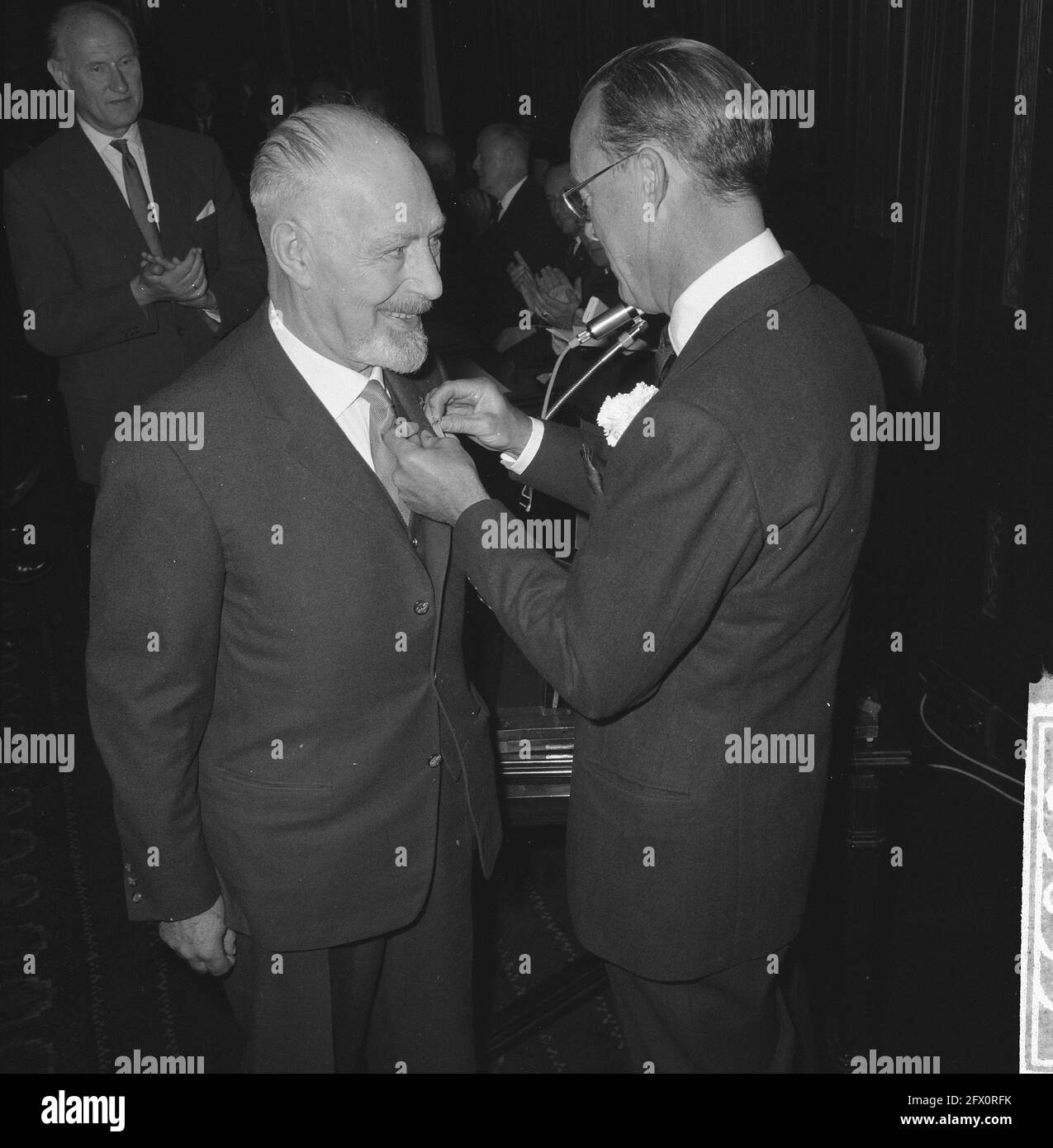 Zilveren Anjer 1964, from left to right jhr. mr. Marinus van der Goes ...