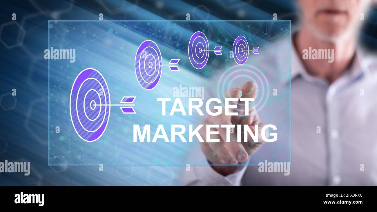 Man touching a target marketing concept on a touch screen with his ...