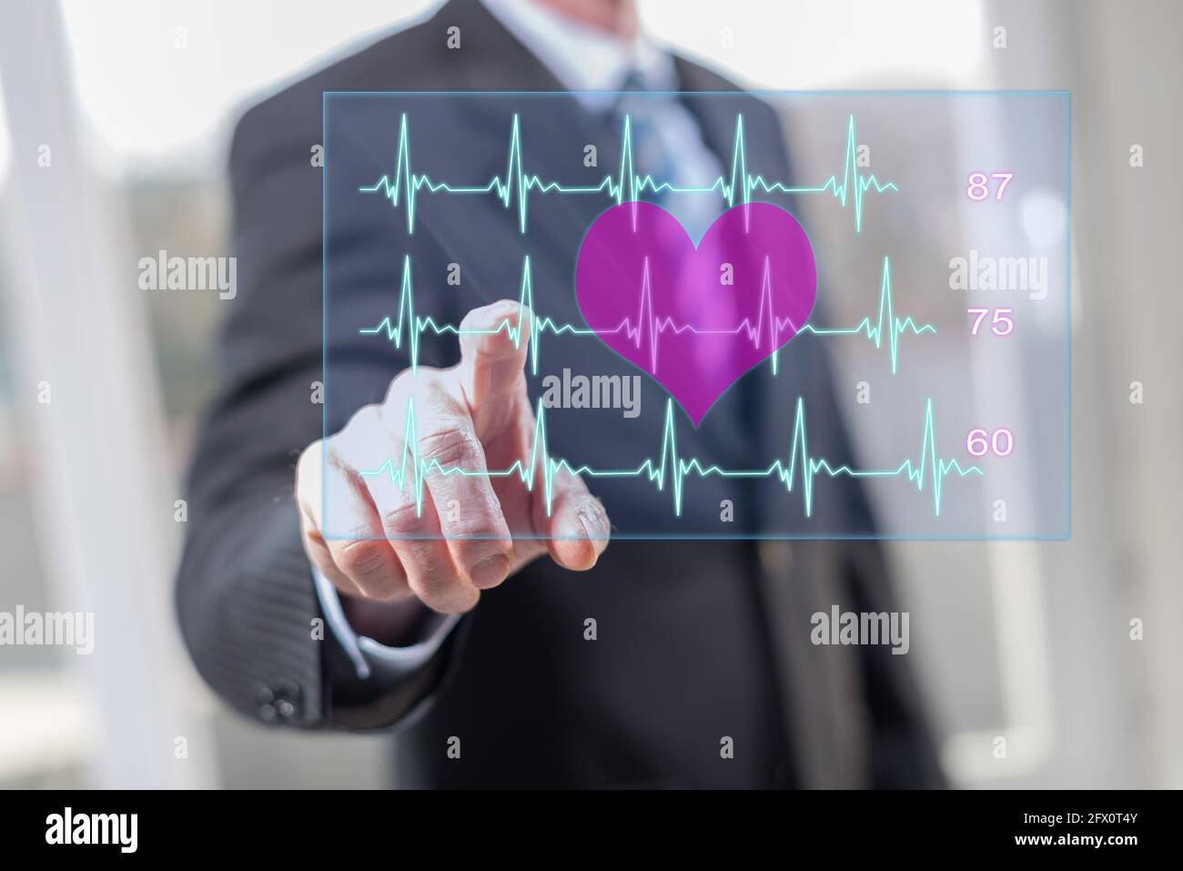Man touching a heart beats graph concept on a touch screen with his ...
