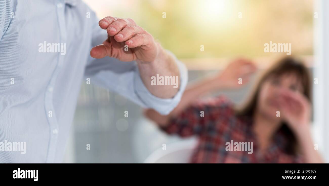 Man about to beat up his wife at home Stock Photo - Alamy