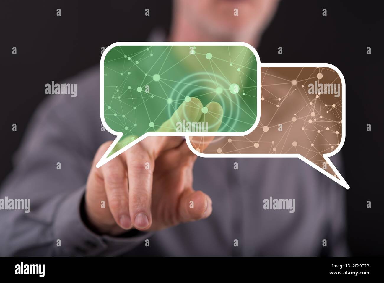 Man touching a communication network concept on a touch screen with his ...