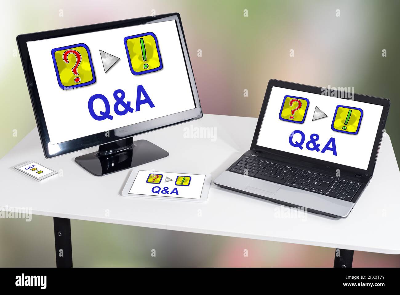 Q&a concept shown on different information technology devices Stock ...