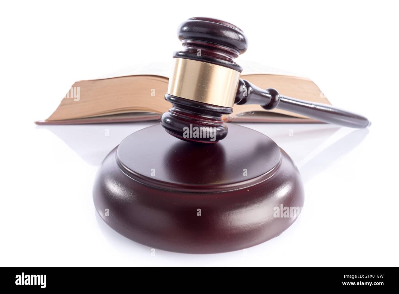 Judge hammer with law book, isolated on white Stock Photo - Alamy