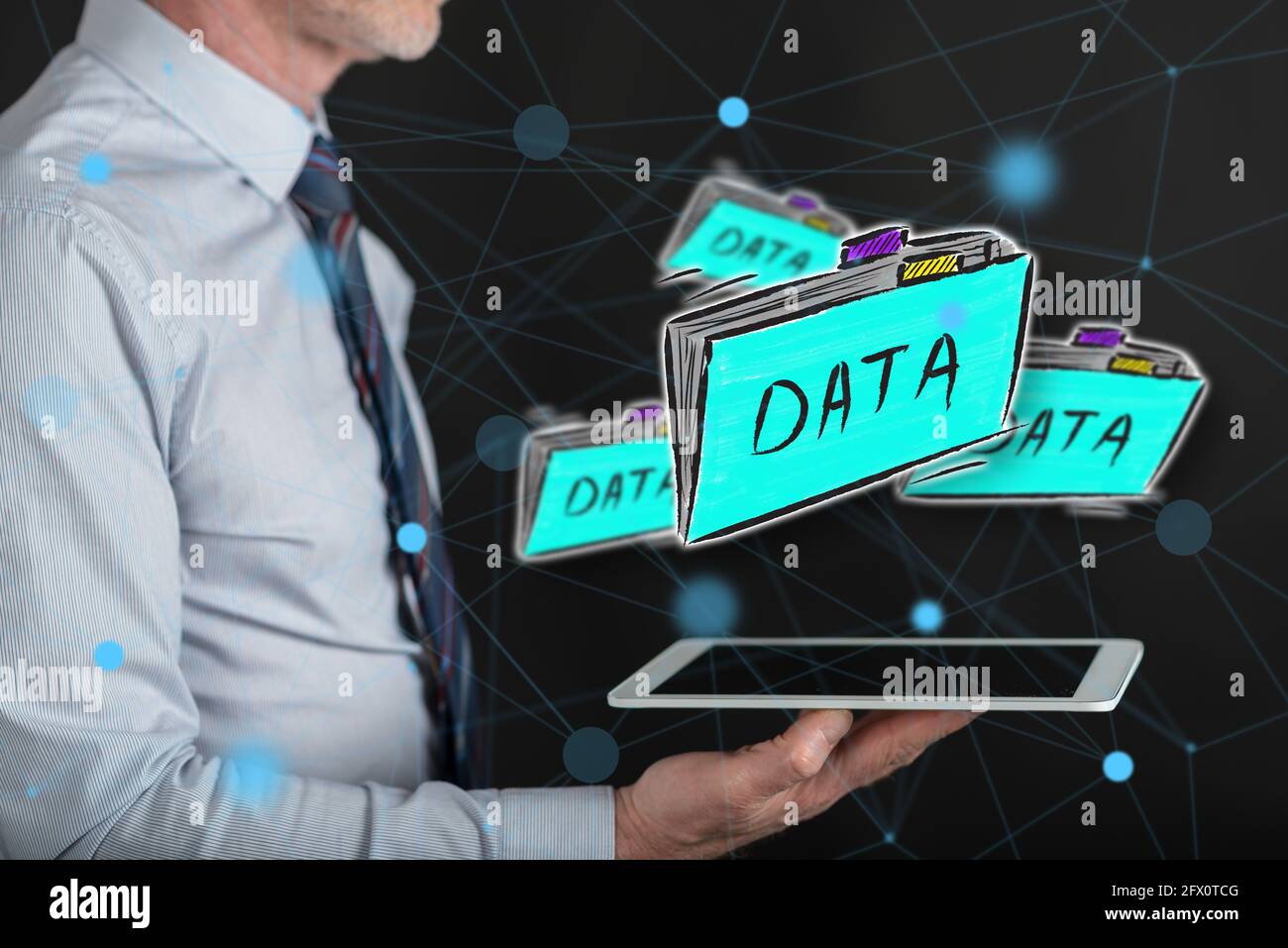 Data concept above a tablet held by a man Stock Photo - Alamy
