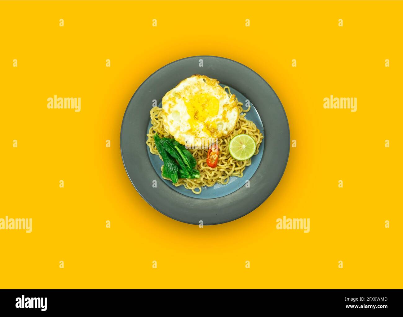 Indonesian Mie Goreng or Fried Noodle with egg traditional Indonesian ...