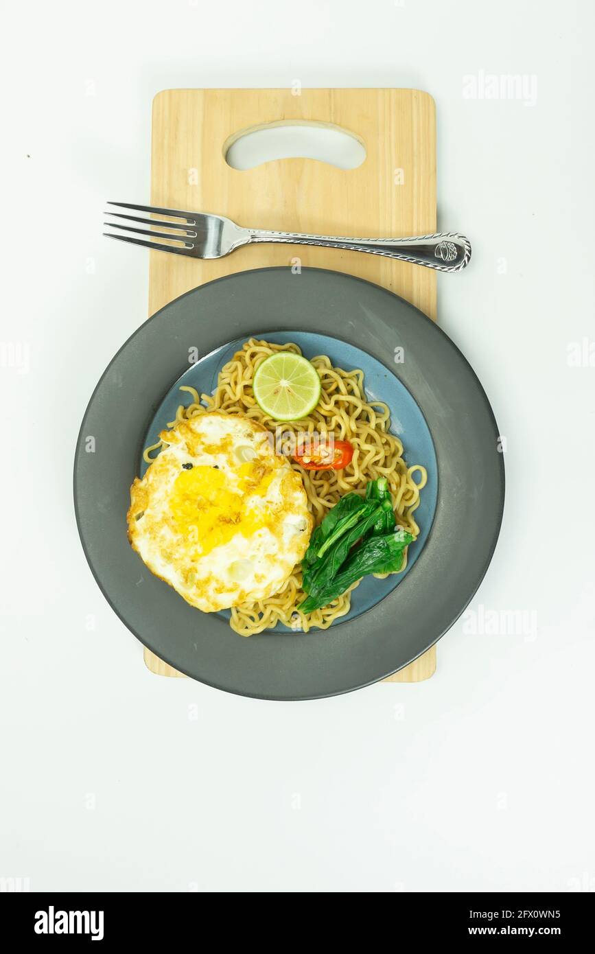 Indonesian Mie Goreng or Fried Noodle with egg traditional Indonesian ...