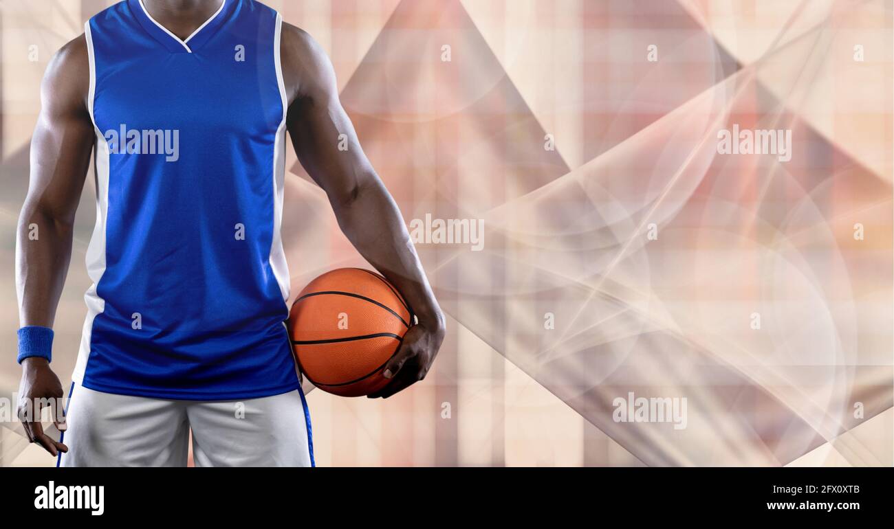 Composition of midsection of basketball player holding ball with copy ...
