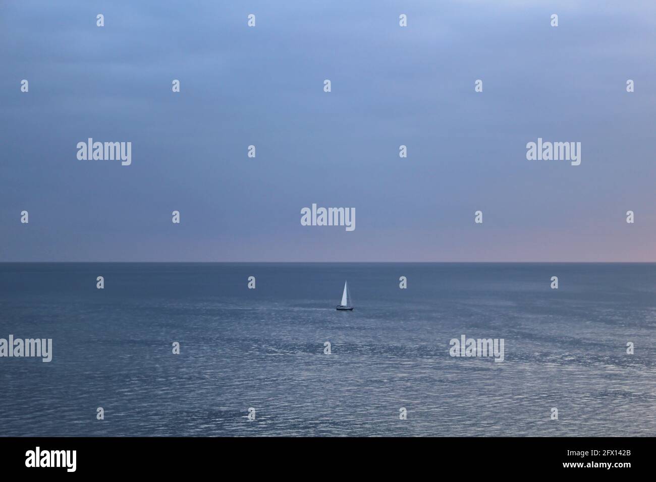 Sailboat in the distance hi-res stock photography and images - Alamy
